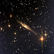 Edge-on galaxy with dust lane | ESO