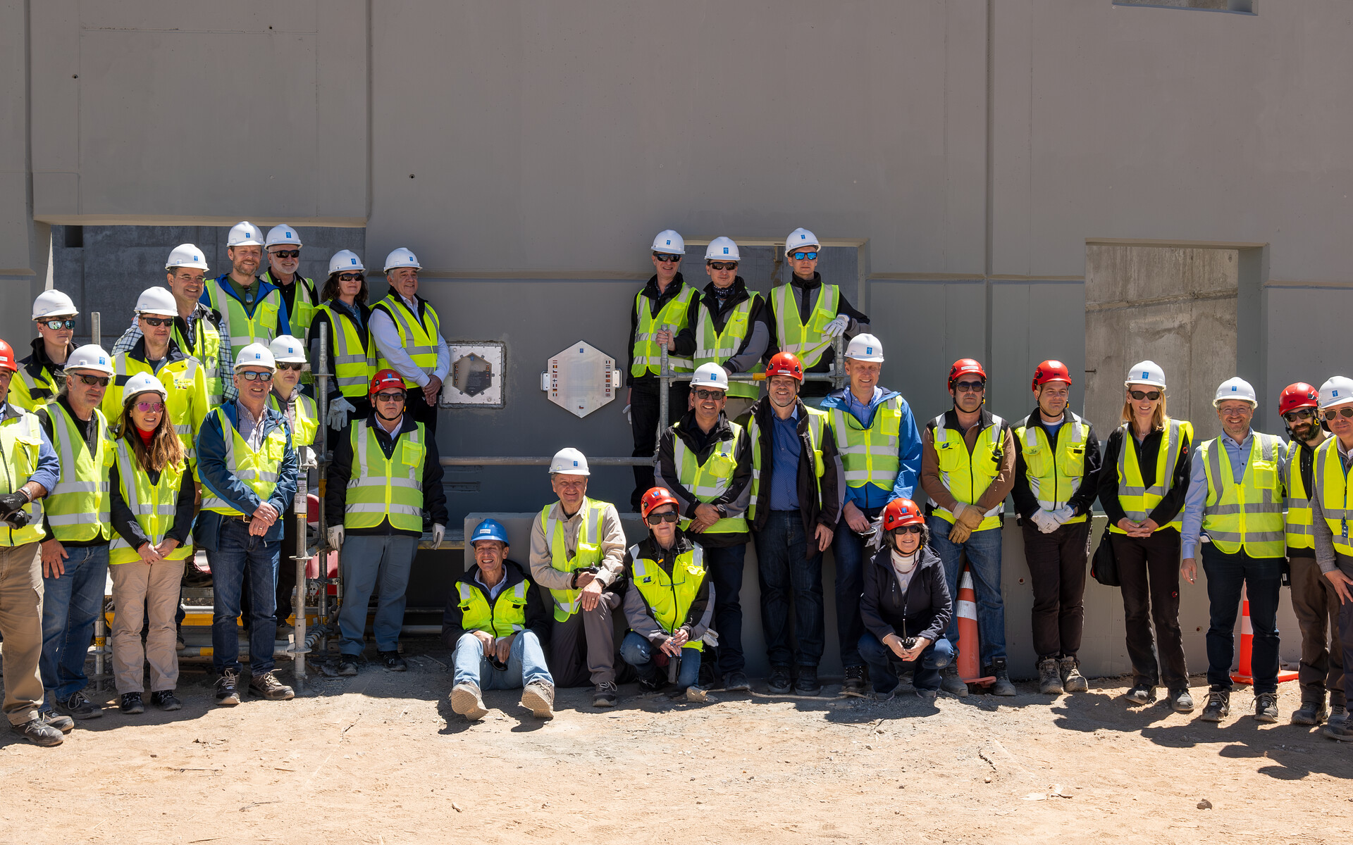 ESO Council members and ESO staff stand next to the ELT time capsule ...