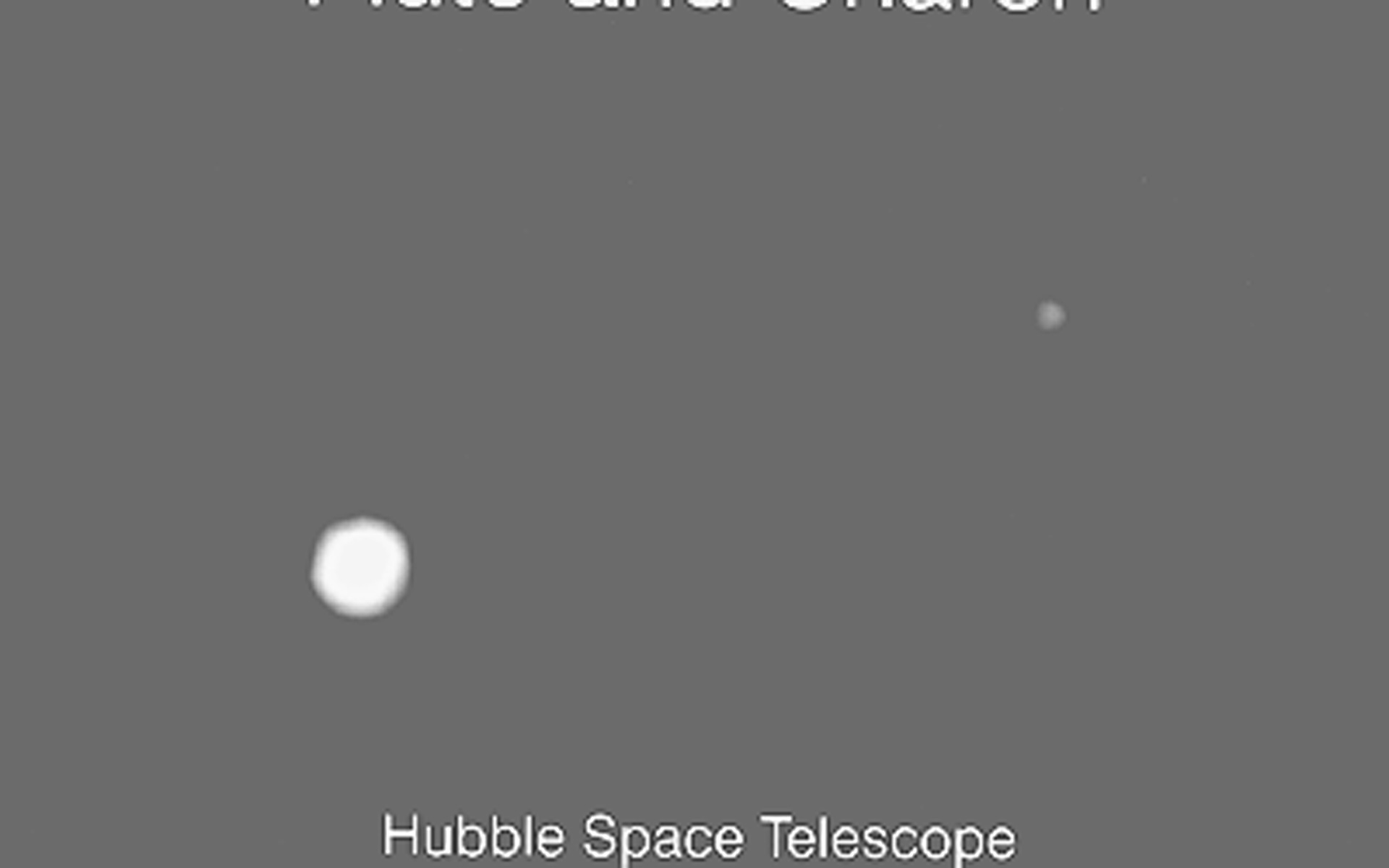 Hubble portrait of the "double planet" Pluto & Charon | ESO